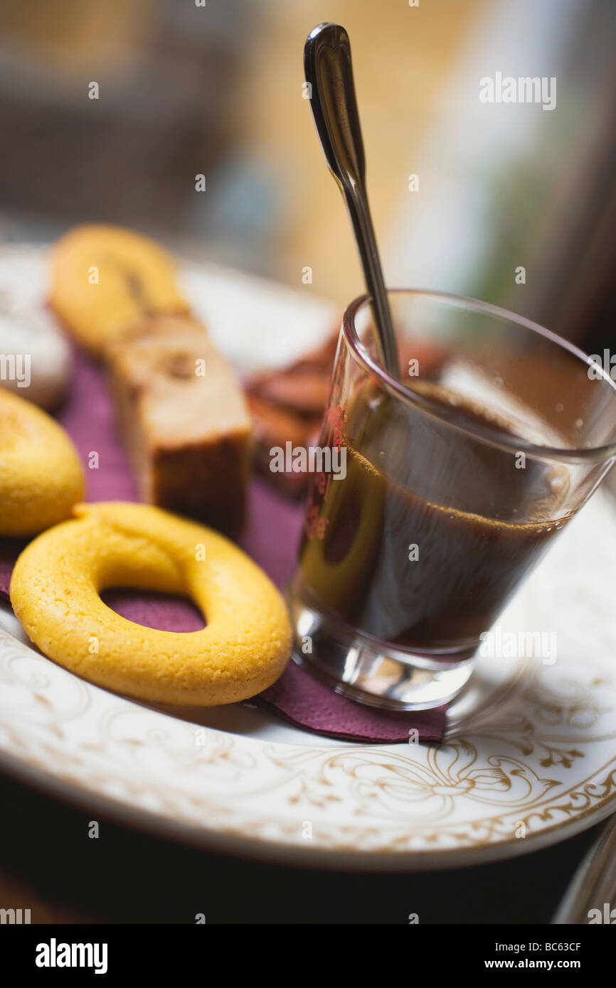 Glass of espresso and assorted Italian biscuits Stock Photo - Alamy