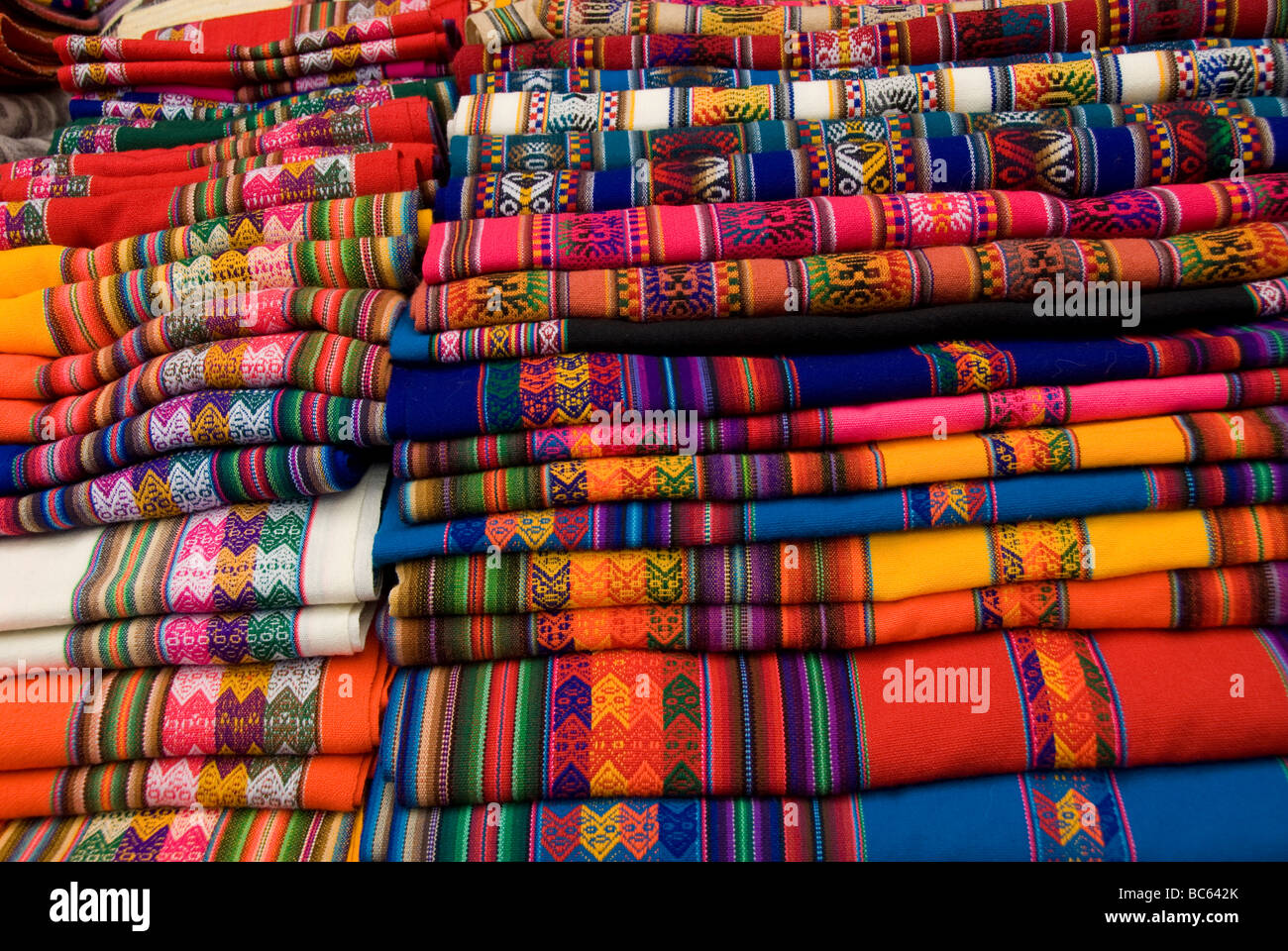 Peru, the Sacred Valley, the village of Pisac, textiles for sale in ...