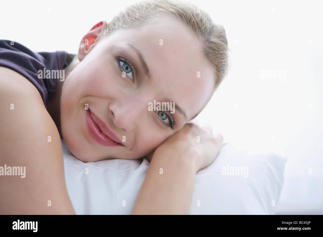 Young woman smiling, portrait, close-up Stock Photo - Alamy