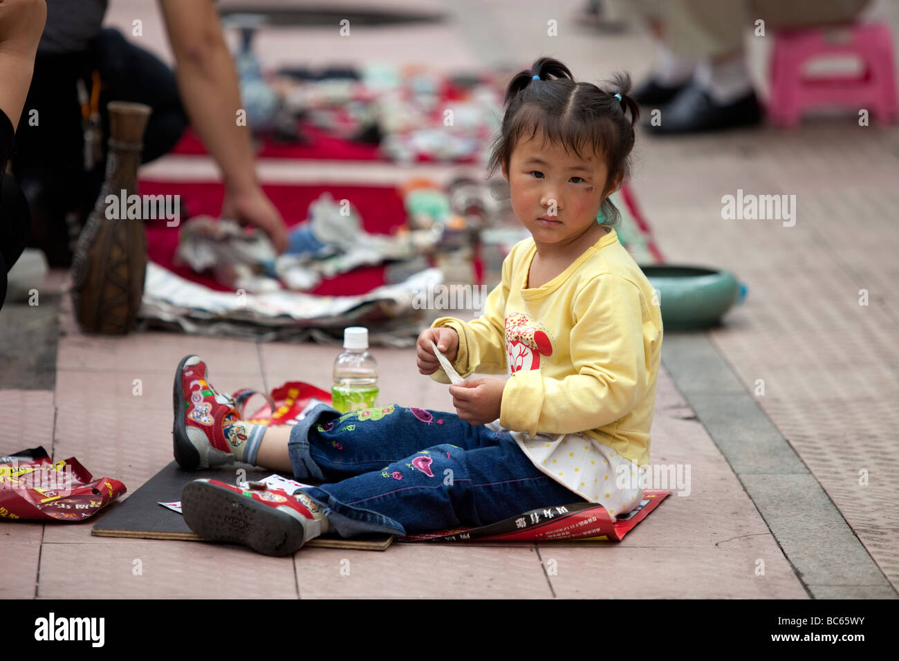 Poor girl hi-res stock photography and images - Alamy