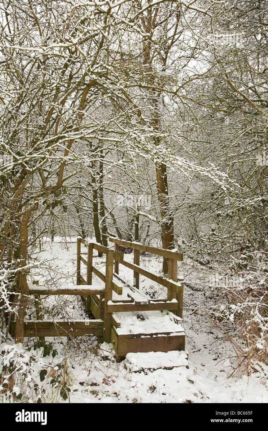 Bridge in snow Stock Photo - Alamy