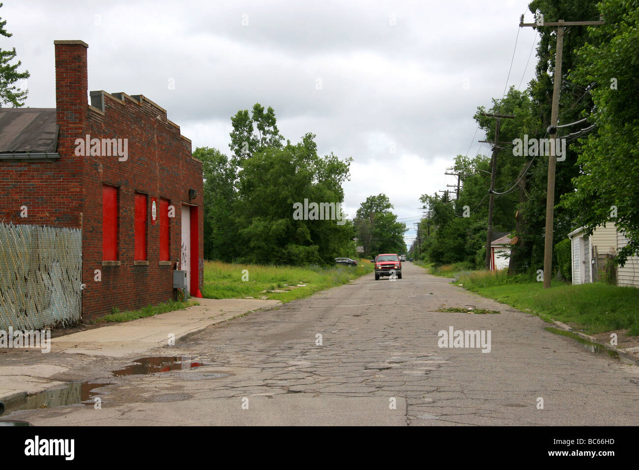 Overgrown and rundown street in Detroit Michigan USA Stock Photo - Alamy