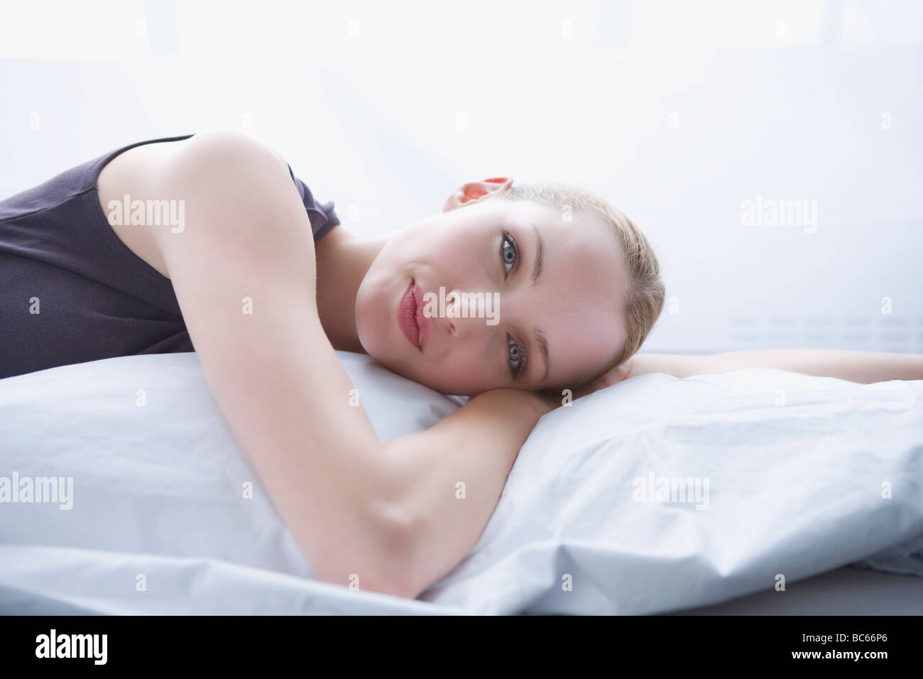 Young woman relaxing, portrait Stock Photo - Alamy