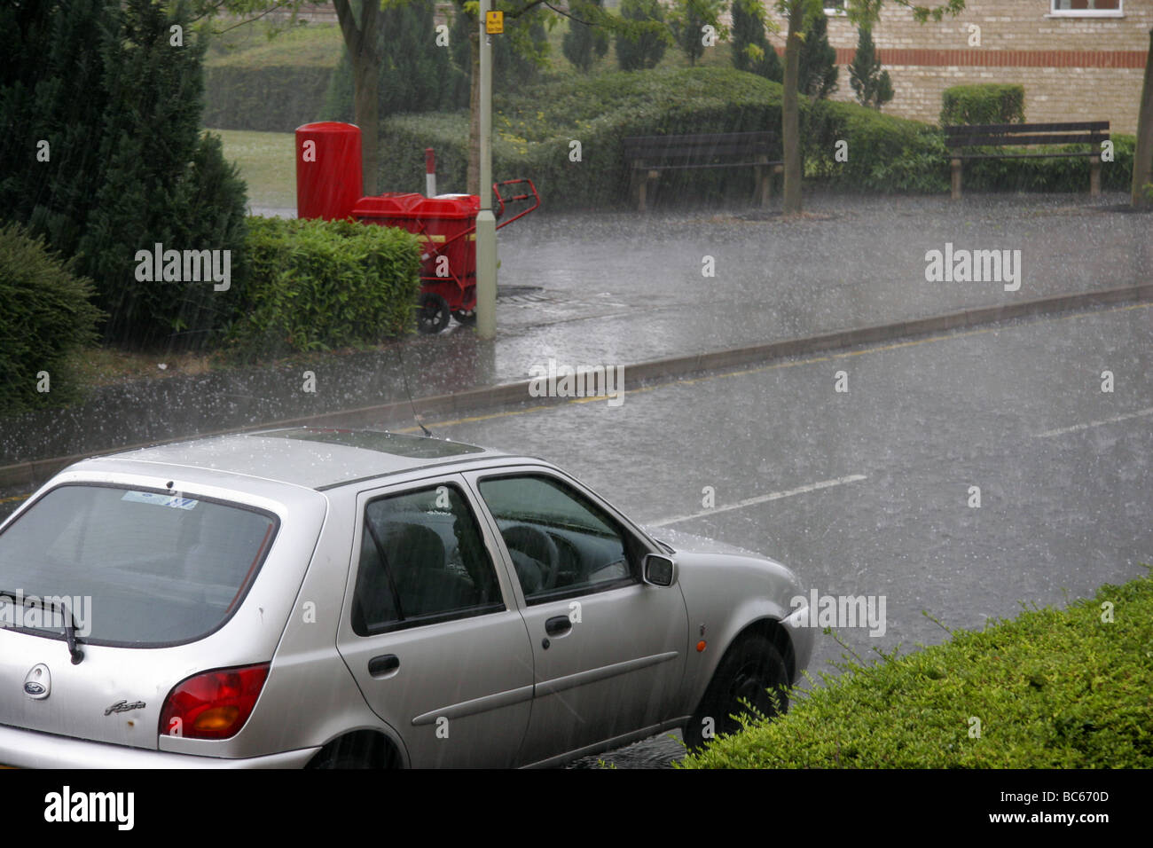 Heavy rain and hail during a summer storm in England Stock Photo - Alamy