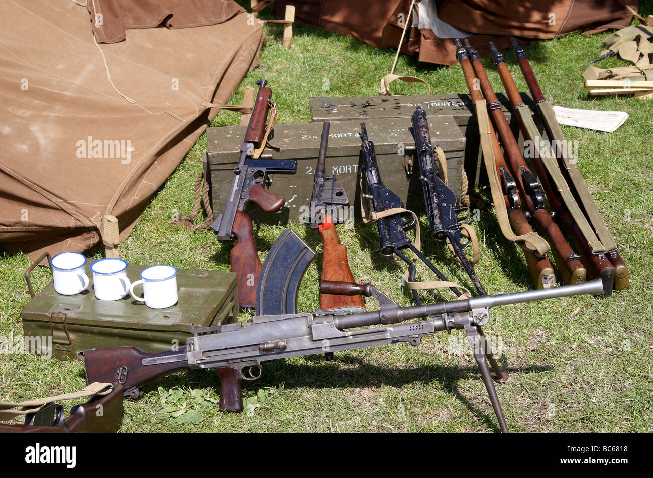 WW2 weapons laid on display at a re-enactment. Bren gun in foreground ...