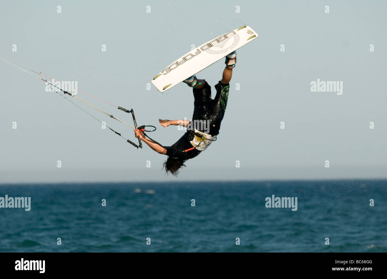 Kite surfer upside down during jump Stock Photo - Alamy