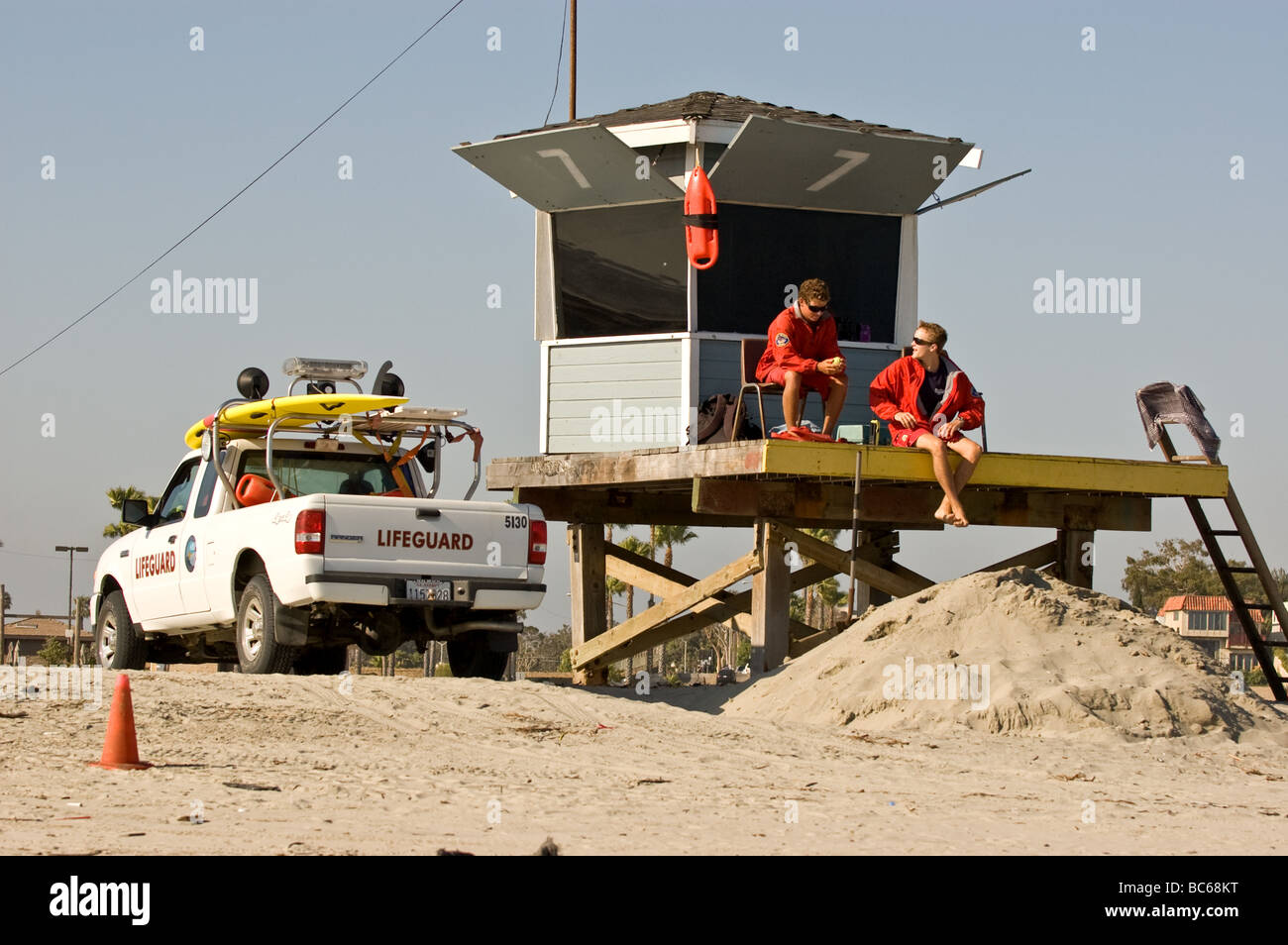 Two young life guards at their life guard tower in Seal Beach ...