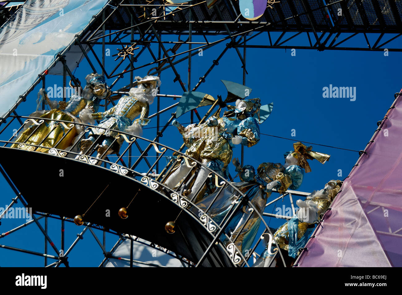 Colourful dummies on the bridge as scenery during of the city St ...