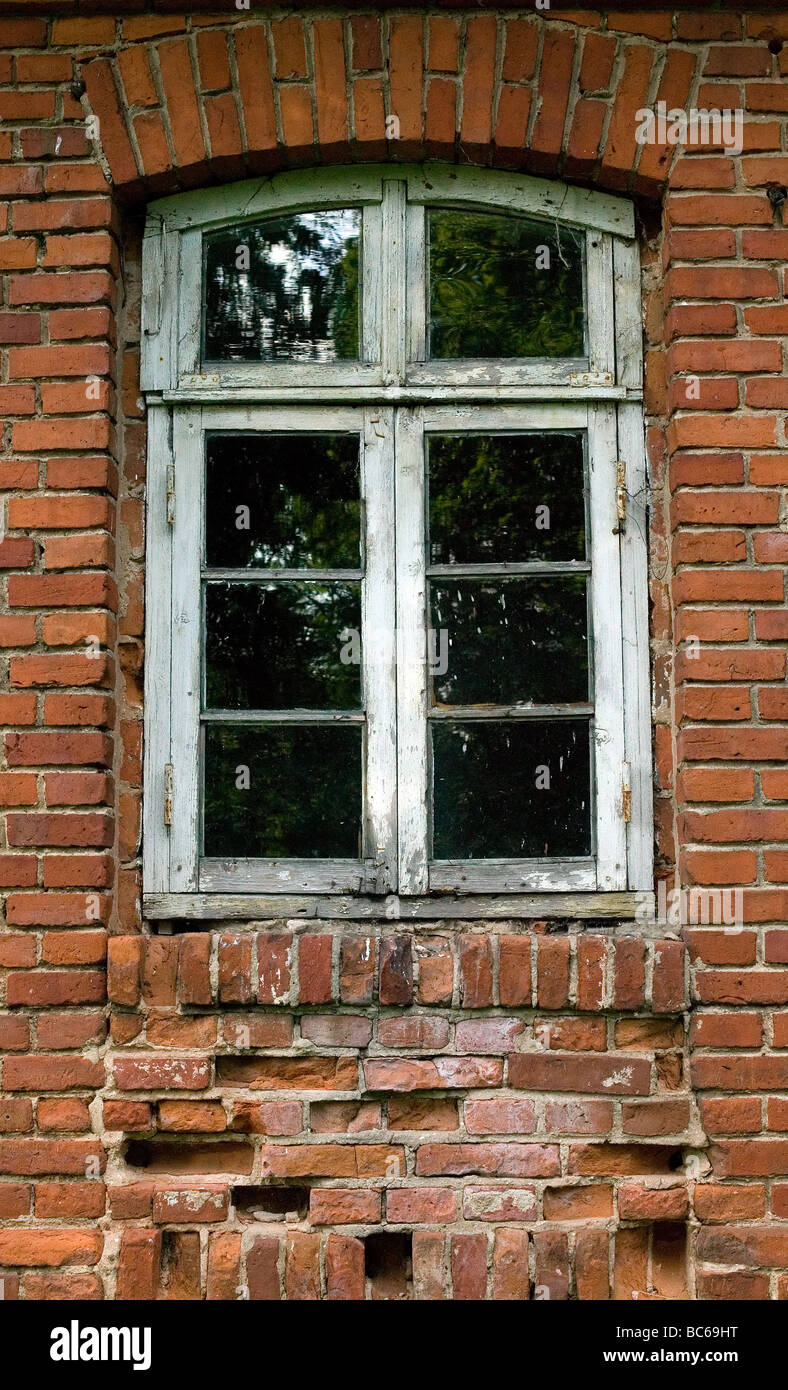 White window in old red brick wall Stock Photo - Alamy
