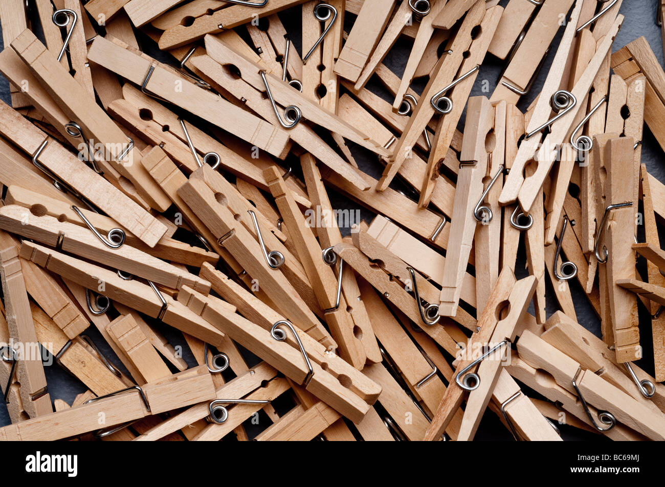 a closeup of a group of clothes pegs Stock Photo - Alamy