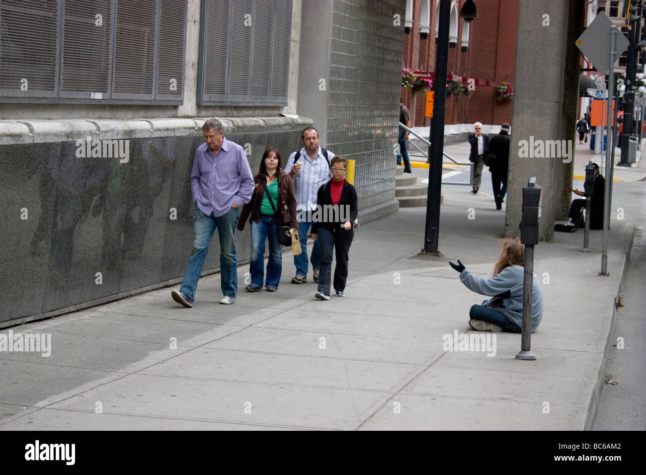Contrast rich poor homeless hi-res stock photography and images - Alamy
