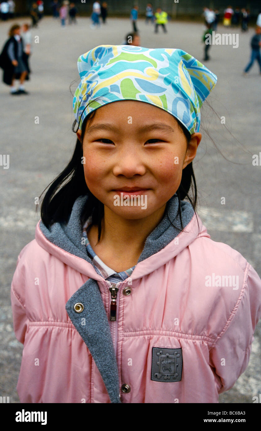 Asian Girl Smiling at Primary School in England Stock Photo - Alamy