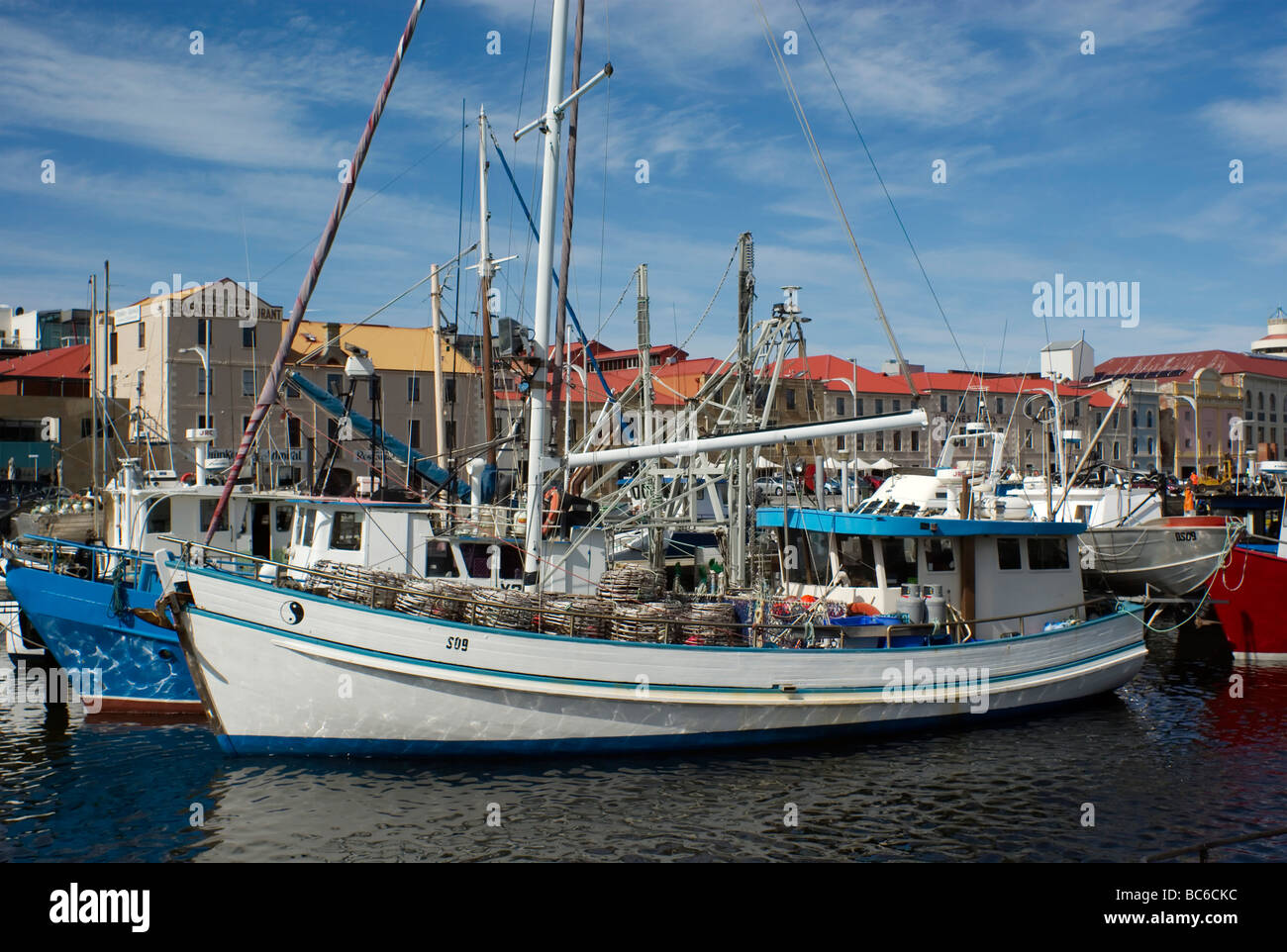 Cray fishing boat in Victoria Dock with the lobster pots on the deck ...