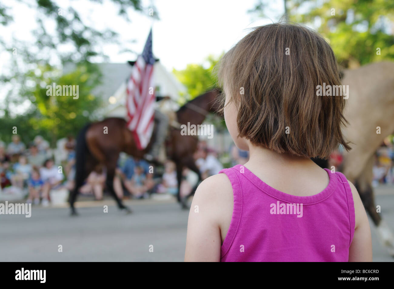 Girl watching parade hi-res stock photography and images - Alamy