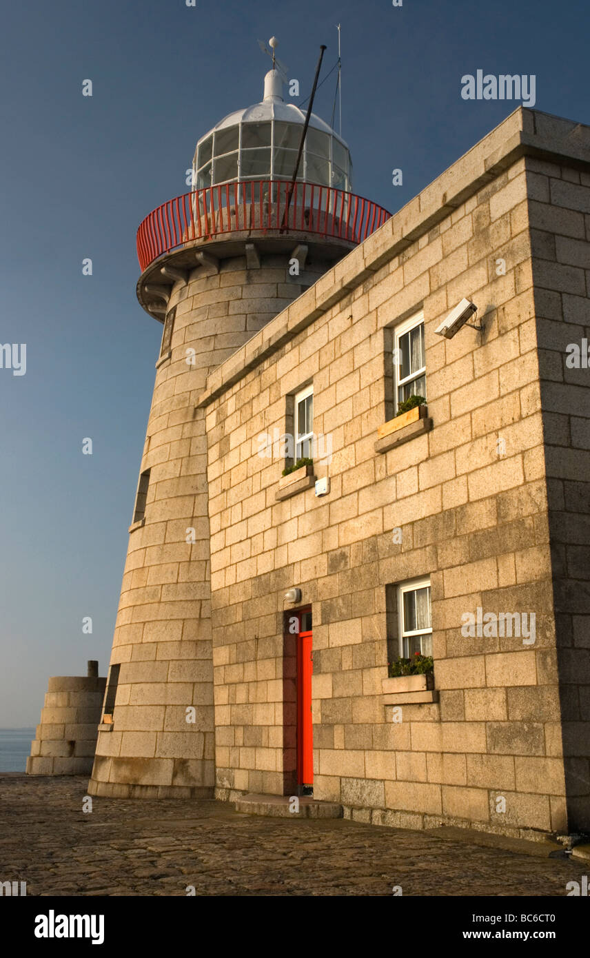 Lighthouse on a pier in Howth, County Dublin, Ireland Stock Photo - Alamy