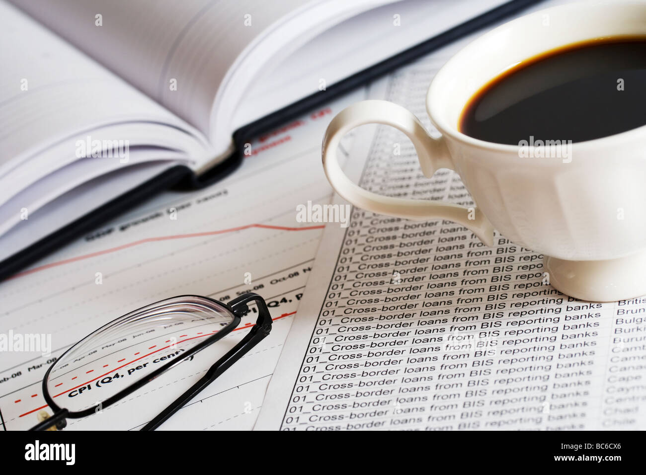 Coffee and accounting Stock Photo - Alamy