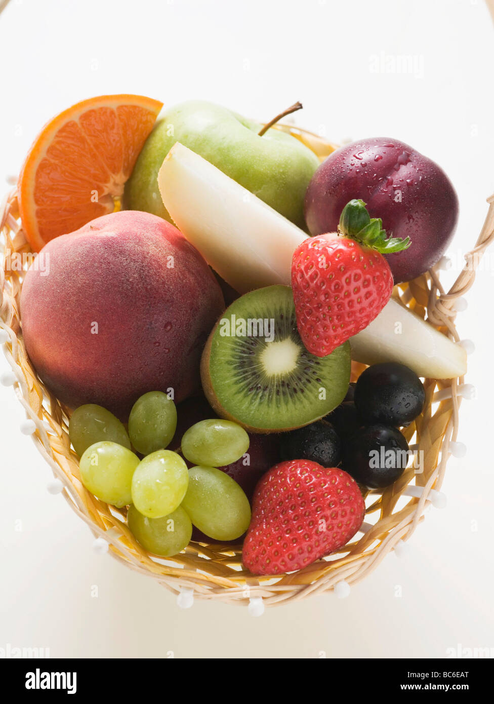 Fresh fruit in basket Stock Photo - Alamy