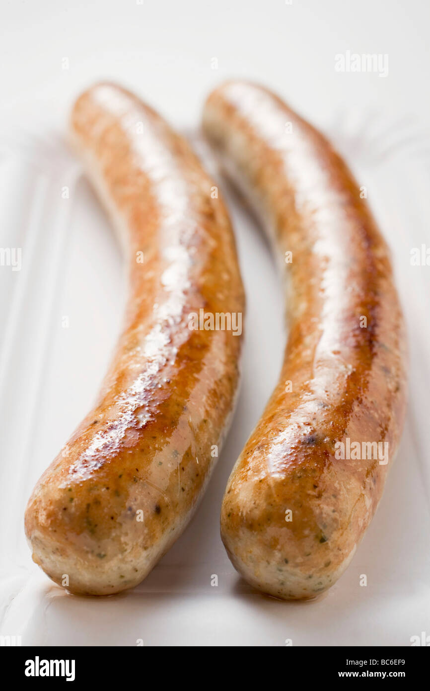 Two sausages (bratwursts) on paper plate Stock Photo - Alamy