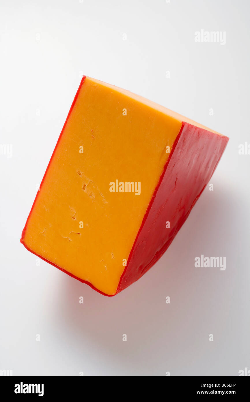 Wedge of Cheddar cheese Stock Photo - Alamy