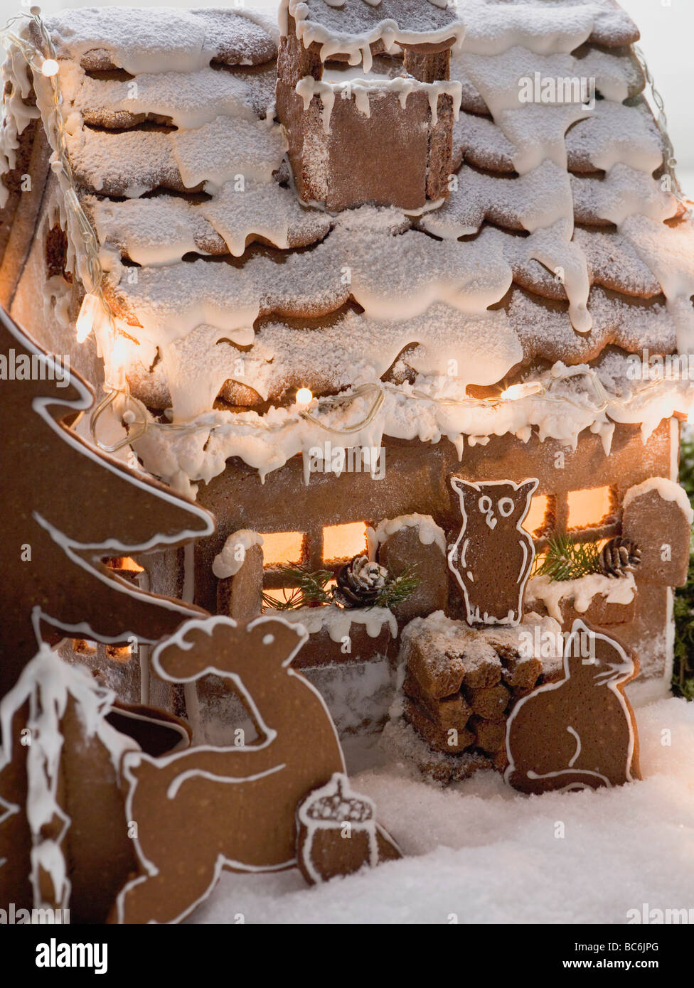 Gingerbread house with gingerbread animals Stock Photo - Alamy