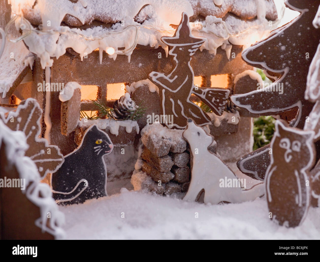 Gingerbread house with gingerbread witch & animals (detail Stock Photo ...