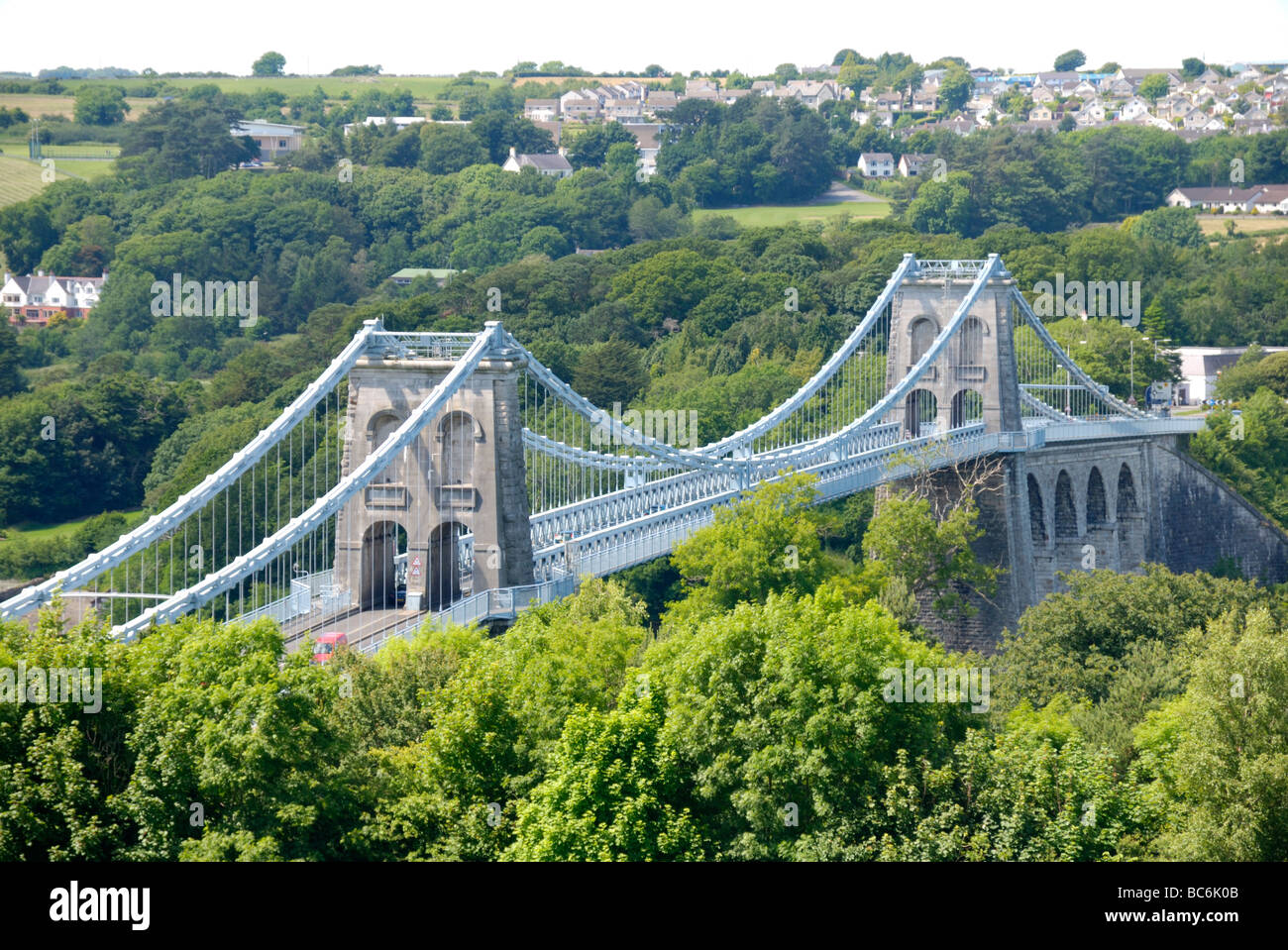 The Menai Bridge spanning the Menai Strait between Anglesey and the ...