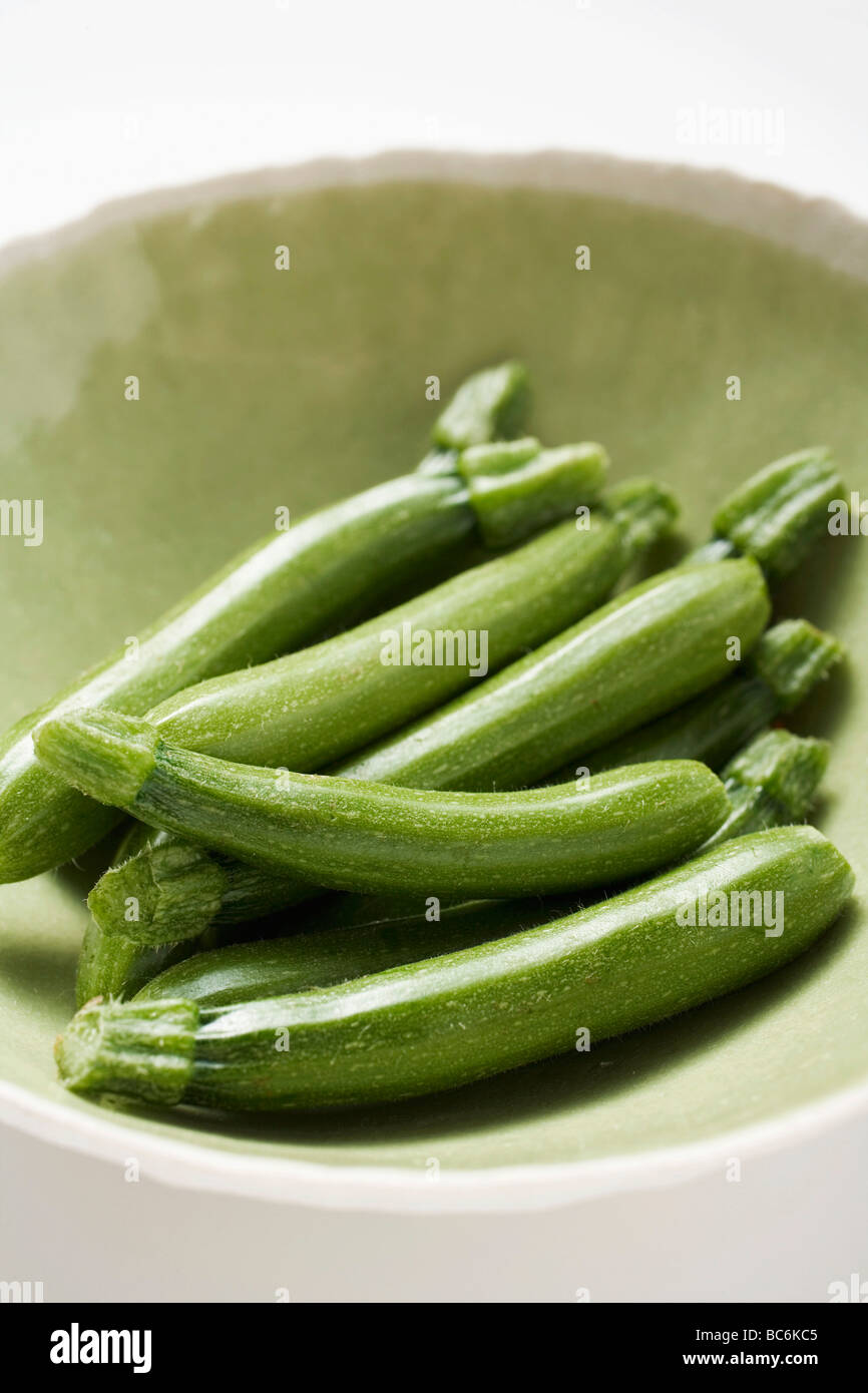 Fresh green baby courgettes hi-res stock photography and images - Alamy