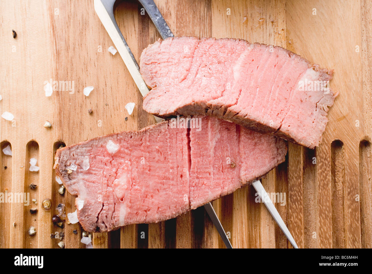 Slices steak fork hi-res stock photography and images - Alamy
