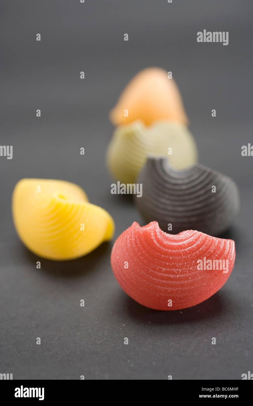 Coloured lumaconi (pasta shells Stock Photo - Alamy