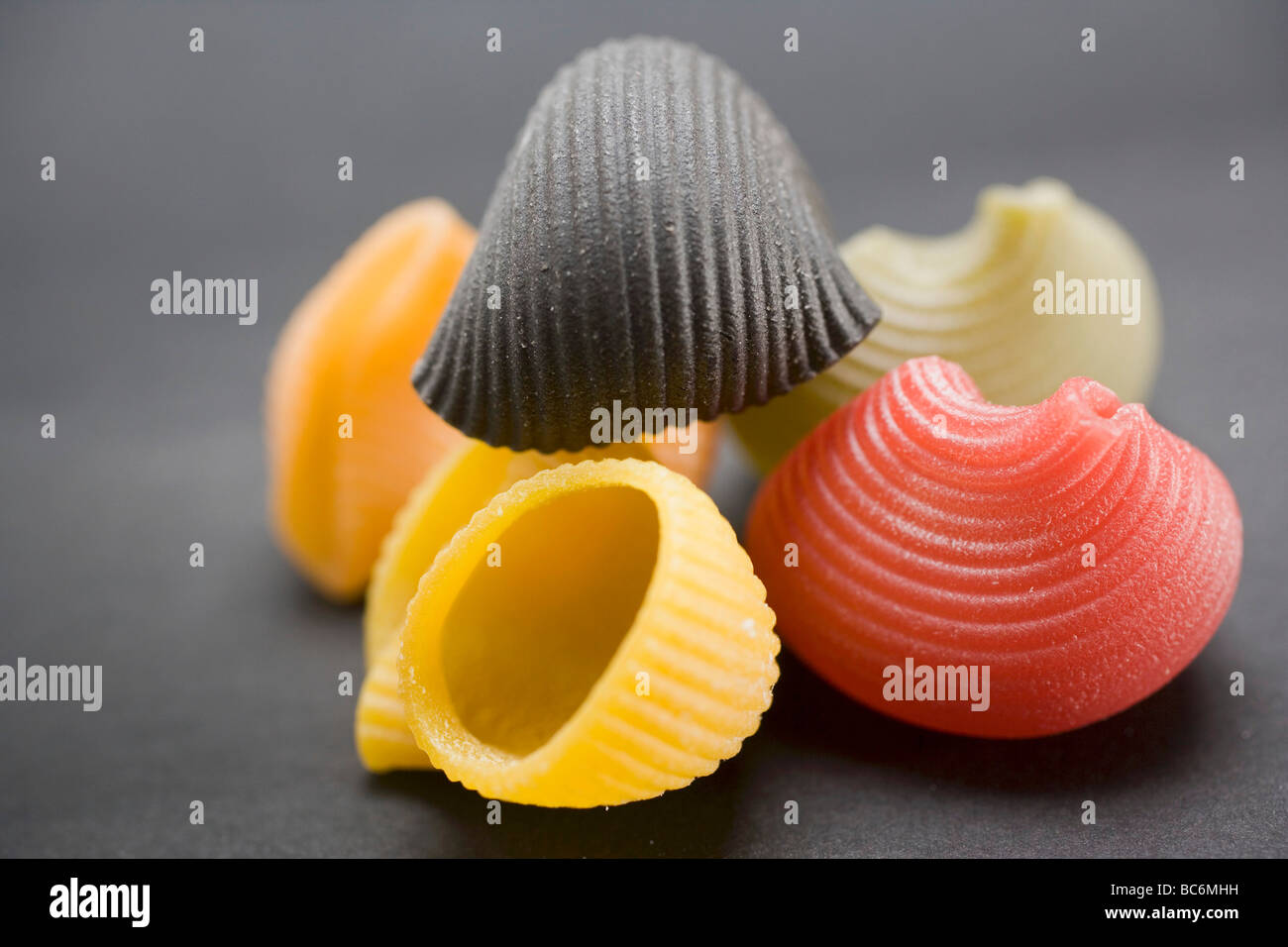 Coloured lumaconi (pasta shells Stock Photo - Alamy