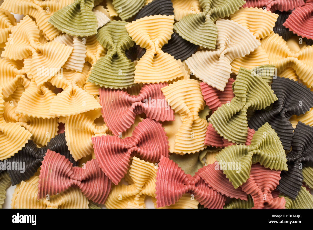 Coloured farfalle (full-frame Stock Photo - Alamy