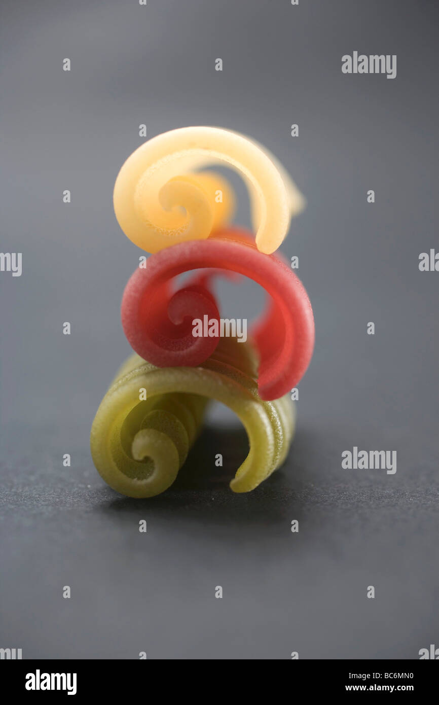 Three coloured riccioli, in a pile Stock Photo - Alamy