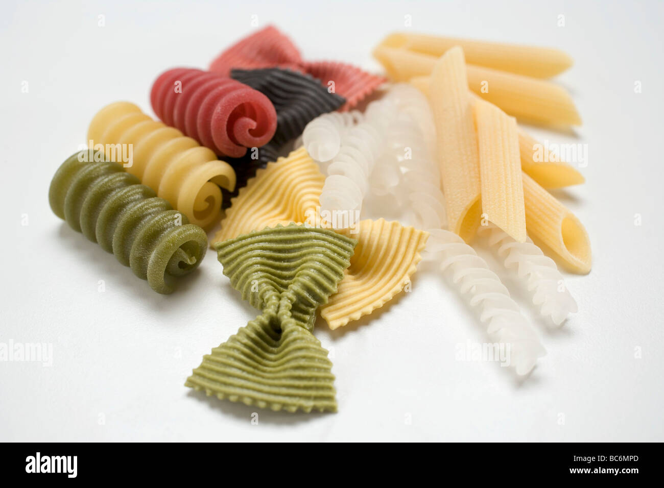 Various types of coloured pasta Stock Photo - Alamy