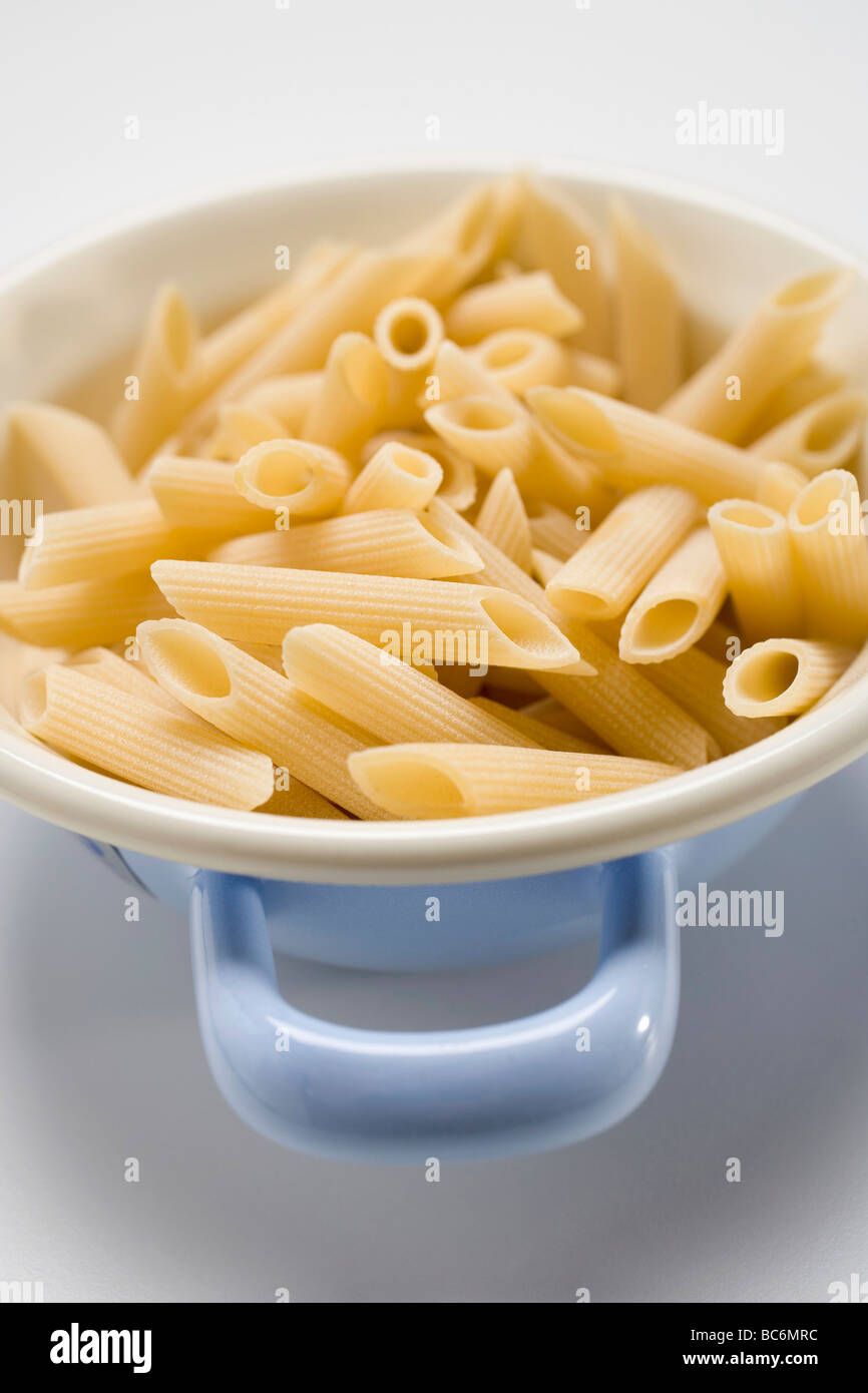 Penne in strainer (detail Stock Photo - Alamy