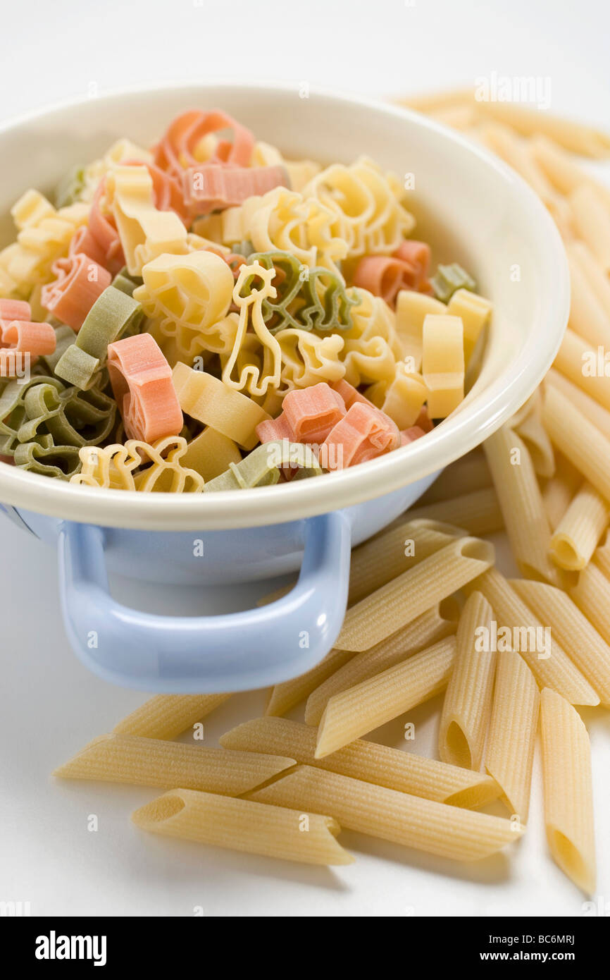Coloured pasta in strainer hi-res stock photography and images - Alamy