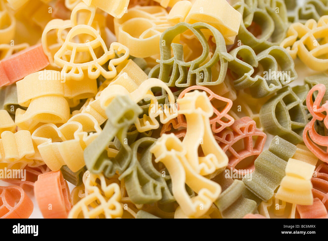 Coloured animal-shaped pasta (full-frame Stock Photo - Alamy