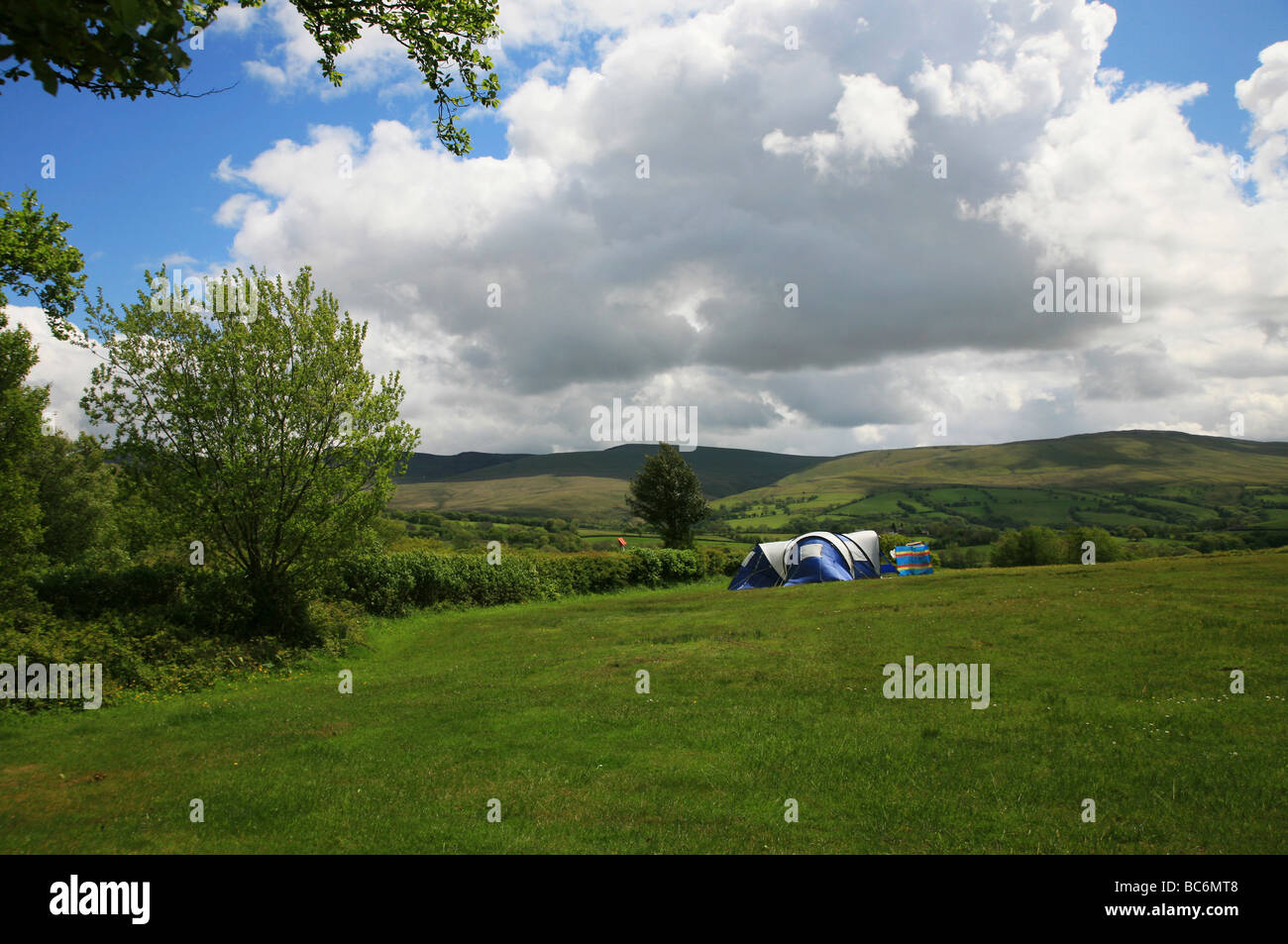 Camp site opposite the Red Pig Inn, a village pub at Llanddeusant near ...