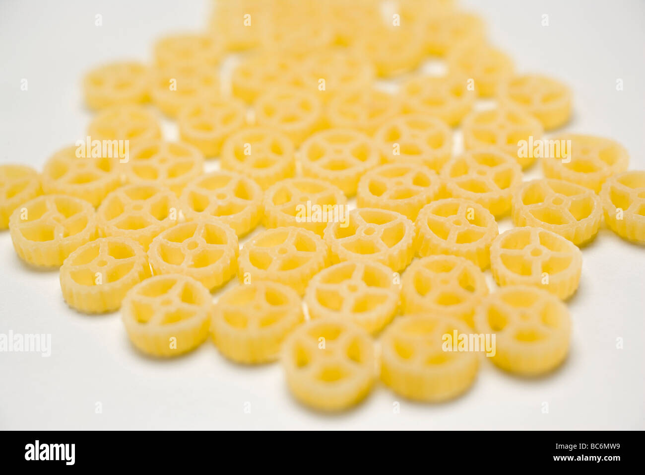 Wagon wheel pasta Stock Photo - Alamy