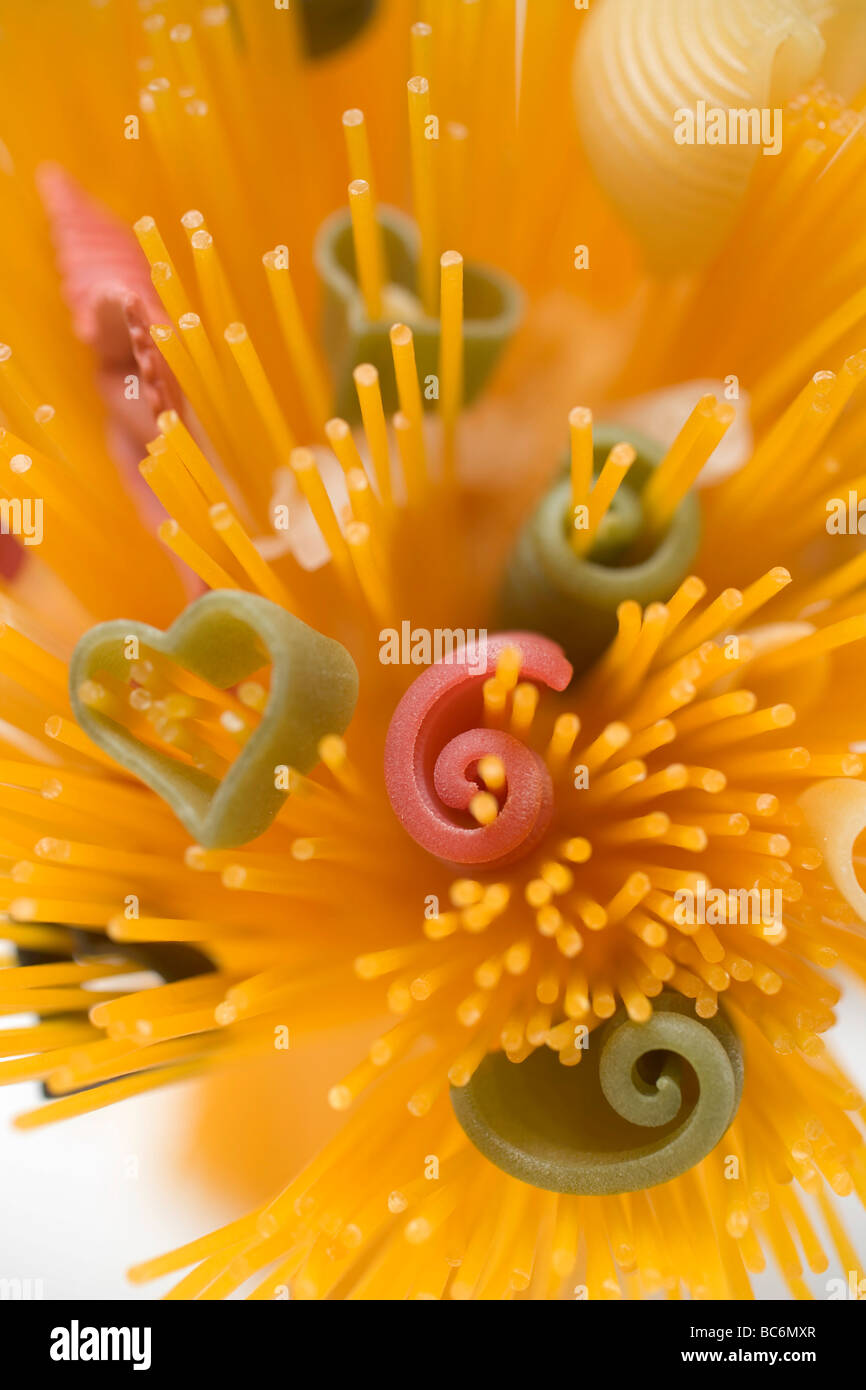 Spaghetti and coloured pasta Stock Photo - Alamy