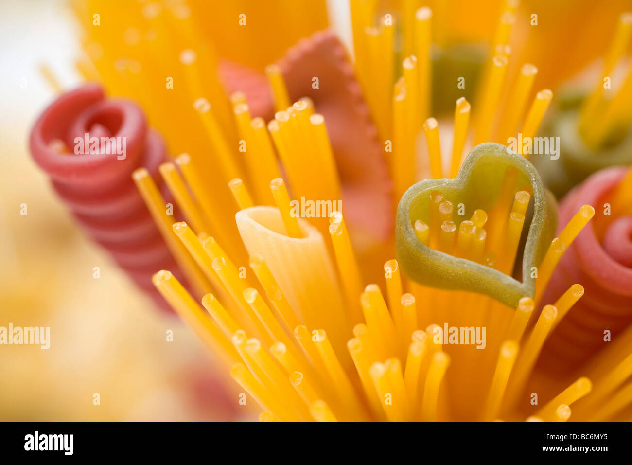 Spaghetti and coloured pasta (detail Stock Photo - Alamy