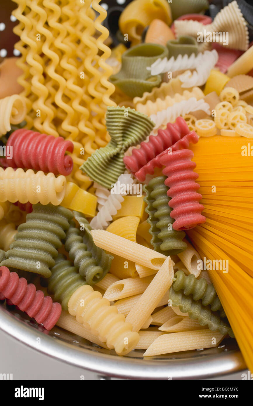 Various types of coloured pasta Stock Photo - Alamy