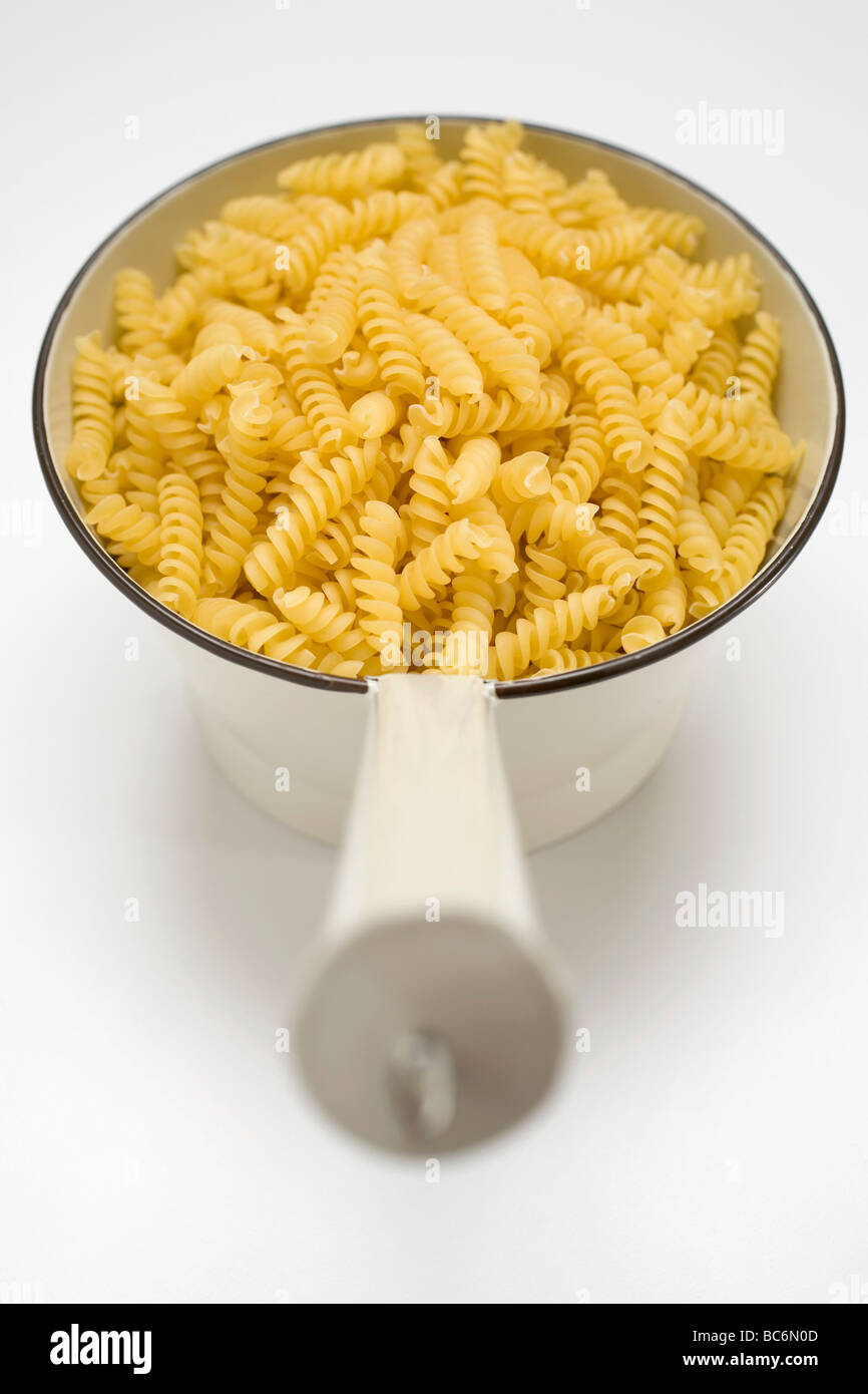 Fusilli in strainer Stock Photo - Alamy