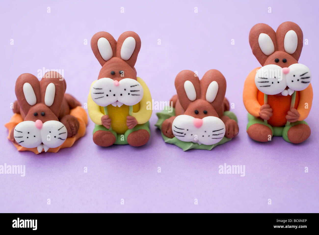 Four marzipan Easter Bunnies Stock Photo - Alamy