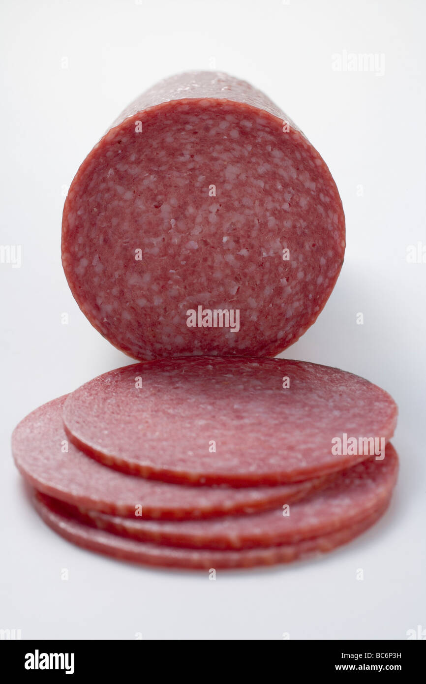 Salami with slices cut Stock Photo - Alamy