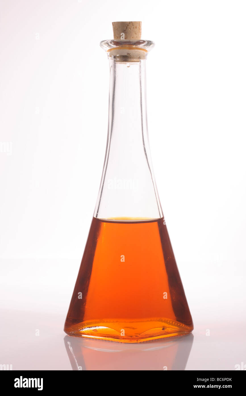 A glass bottle of chilli oil Stock Photo - Alamy