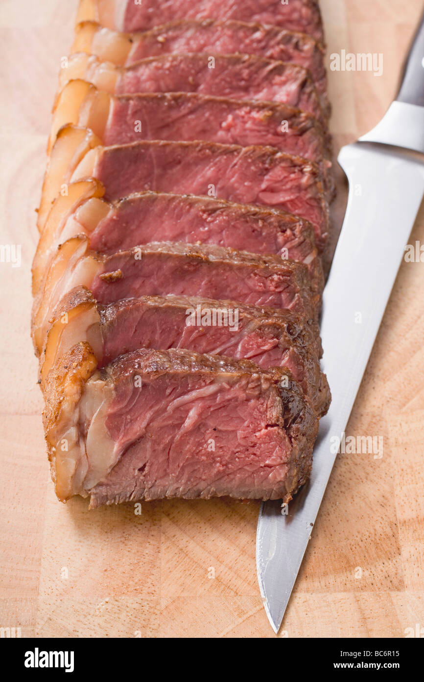 Beef steak with fatty edge, sliced Stock Photo - Alamy