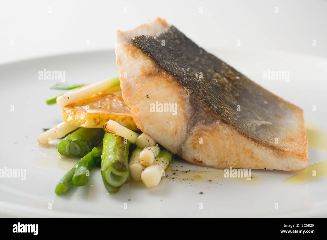Fish fillet with scallion hi-res stock photography and images - Alamy