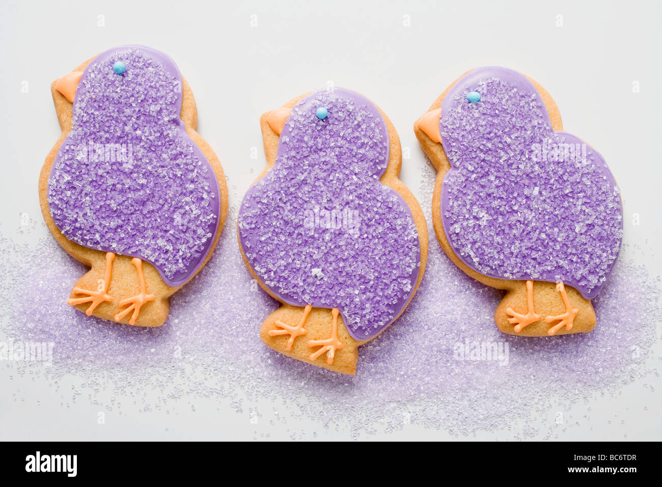 Three Easter biscuits (purple chicks Stock Photo - Alamy