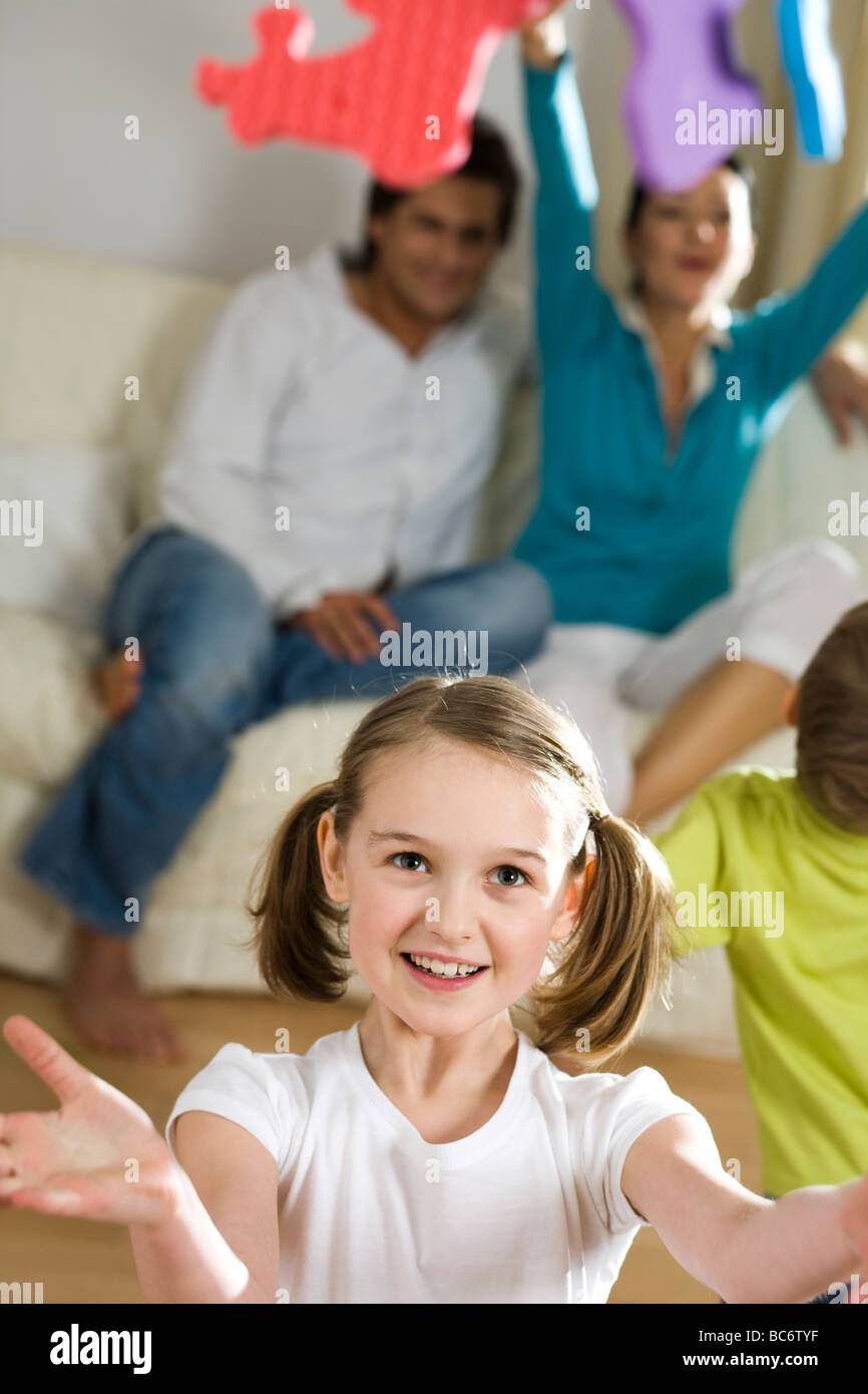 Family at home Stock Photo - Alamy