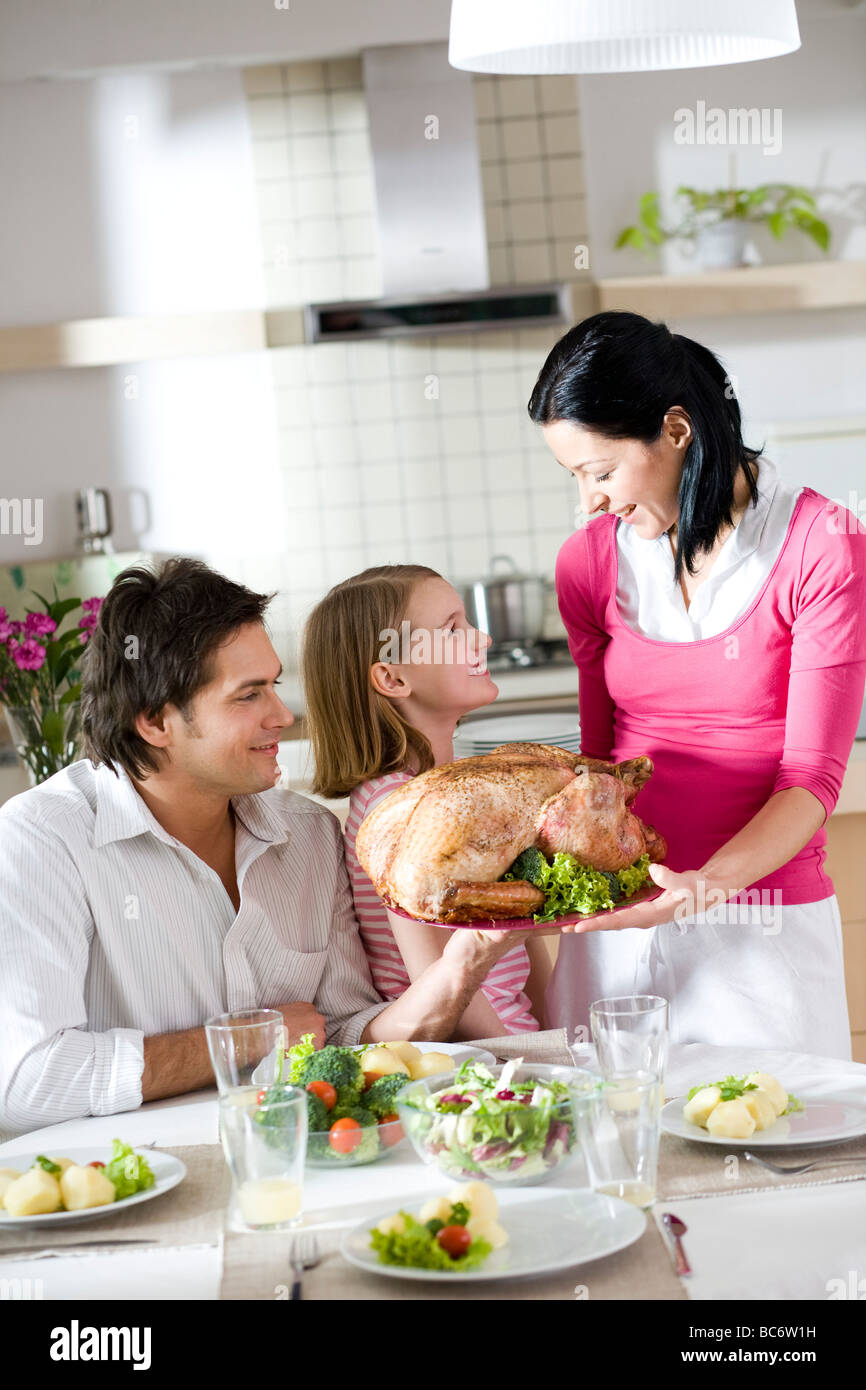 Family dining together Stock Photo - Alamy